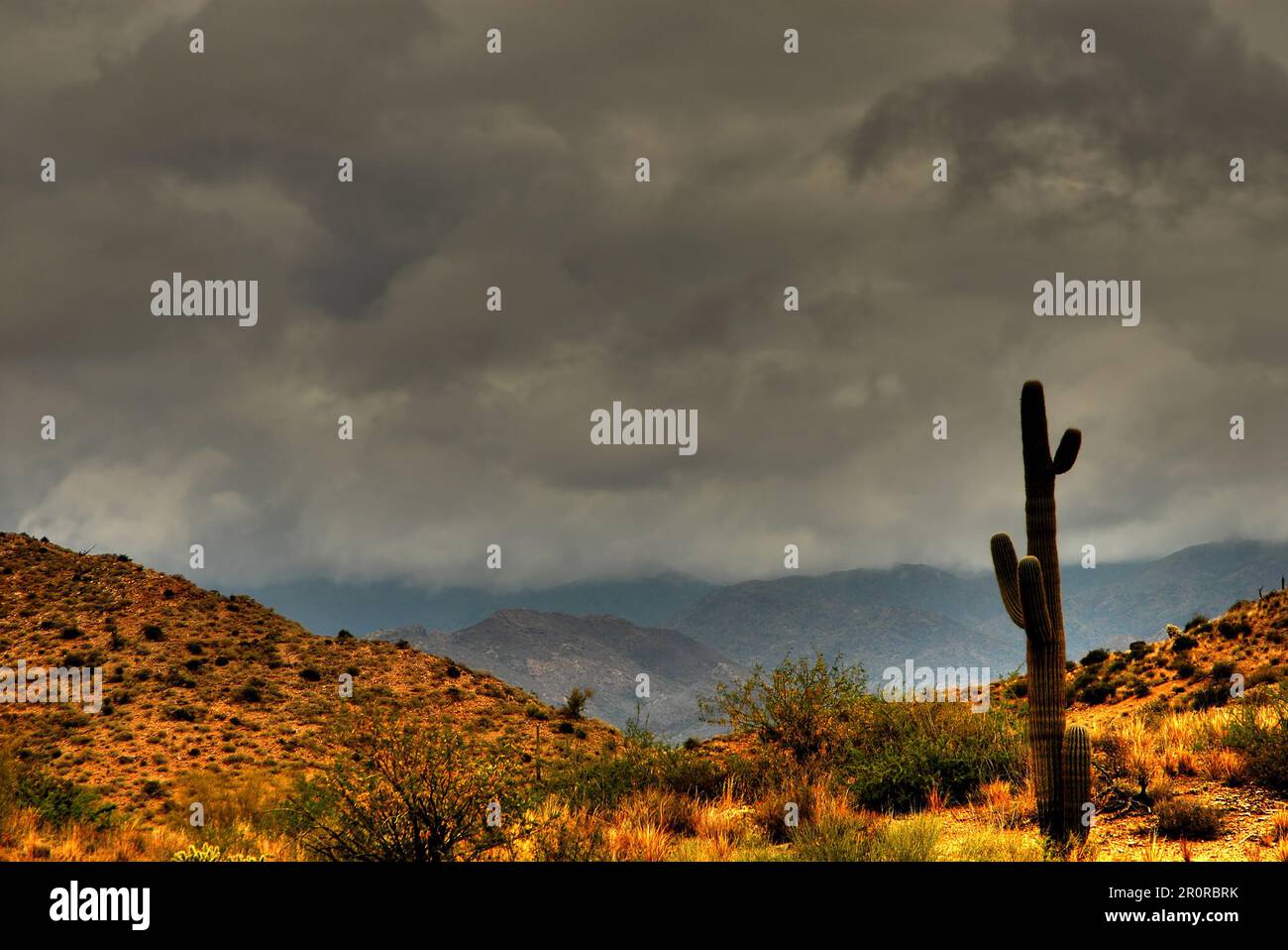 Mountain cliff approaching storm hi-res stock photography and images ...