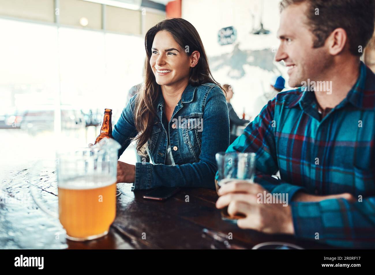 The couple that chills together...a happy young man and woman having ...