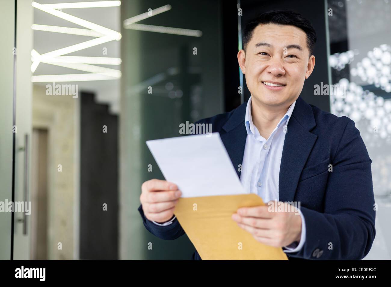 Portrait of successful asian boss in business suit, businessman ...