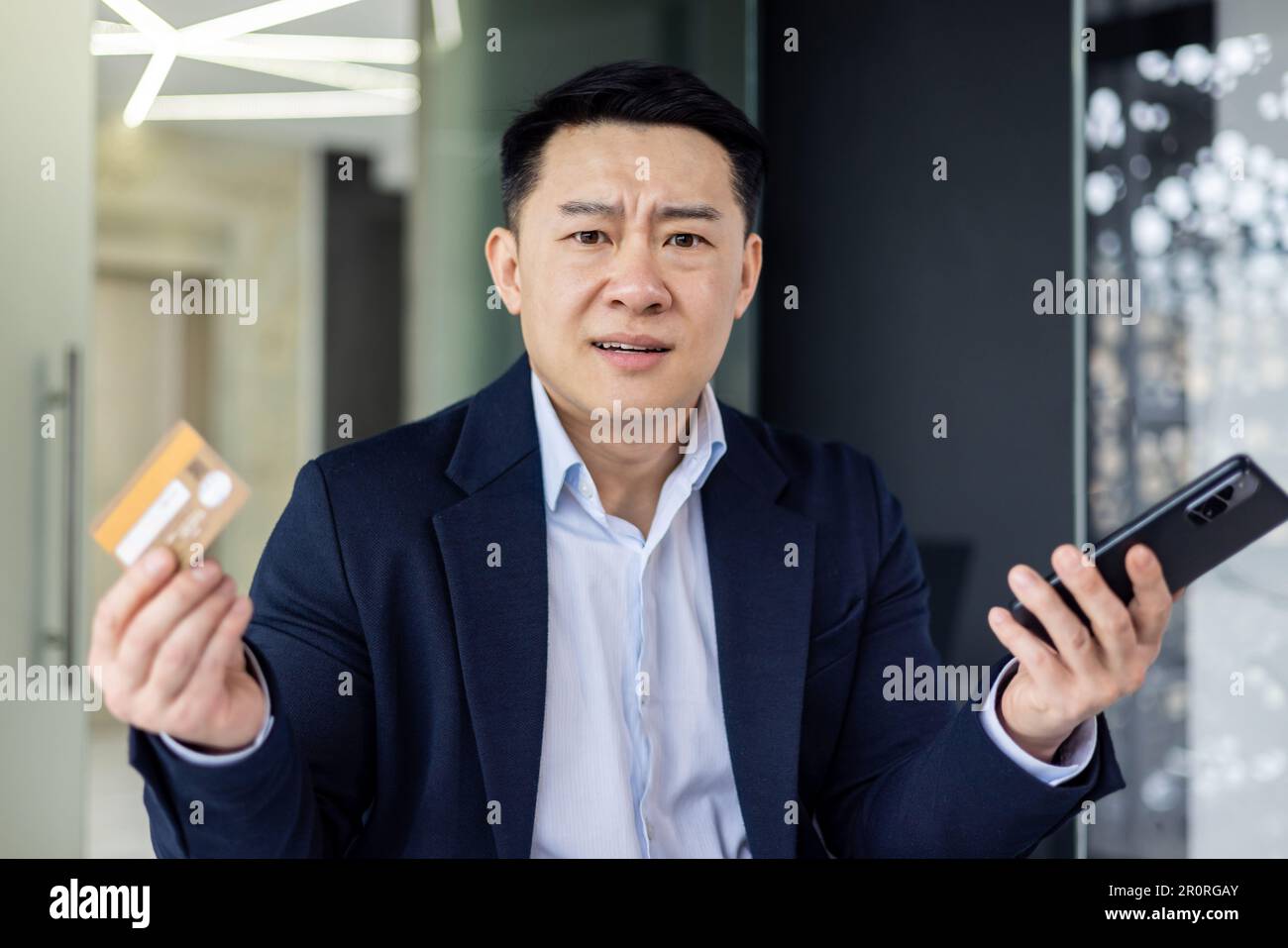 Bank fraud phone scam confused hi-res stock photography and images - Alamy