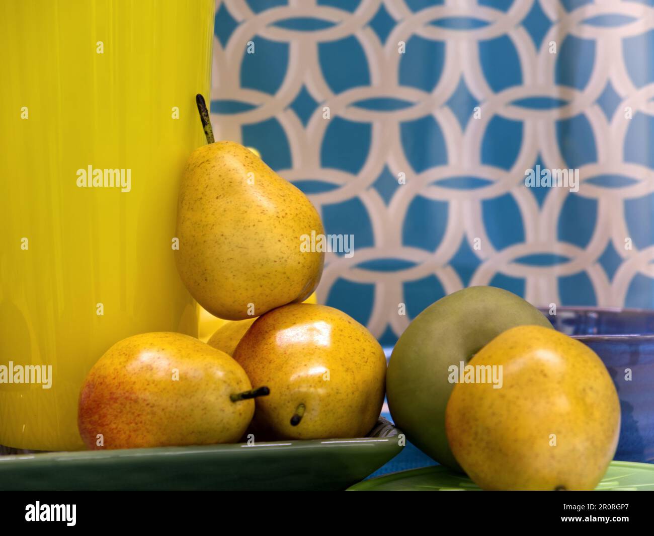 yellow blue pears still life composition Stock Photo - Alamy