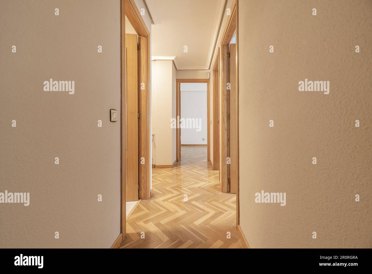 Distributor corridor of a house with access doors to several rooms and ...