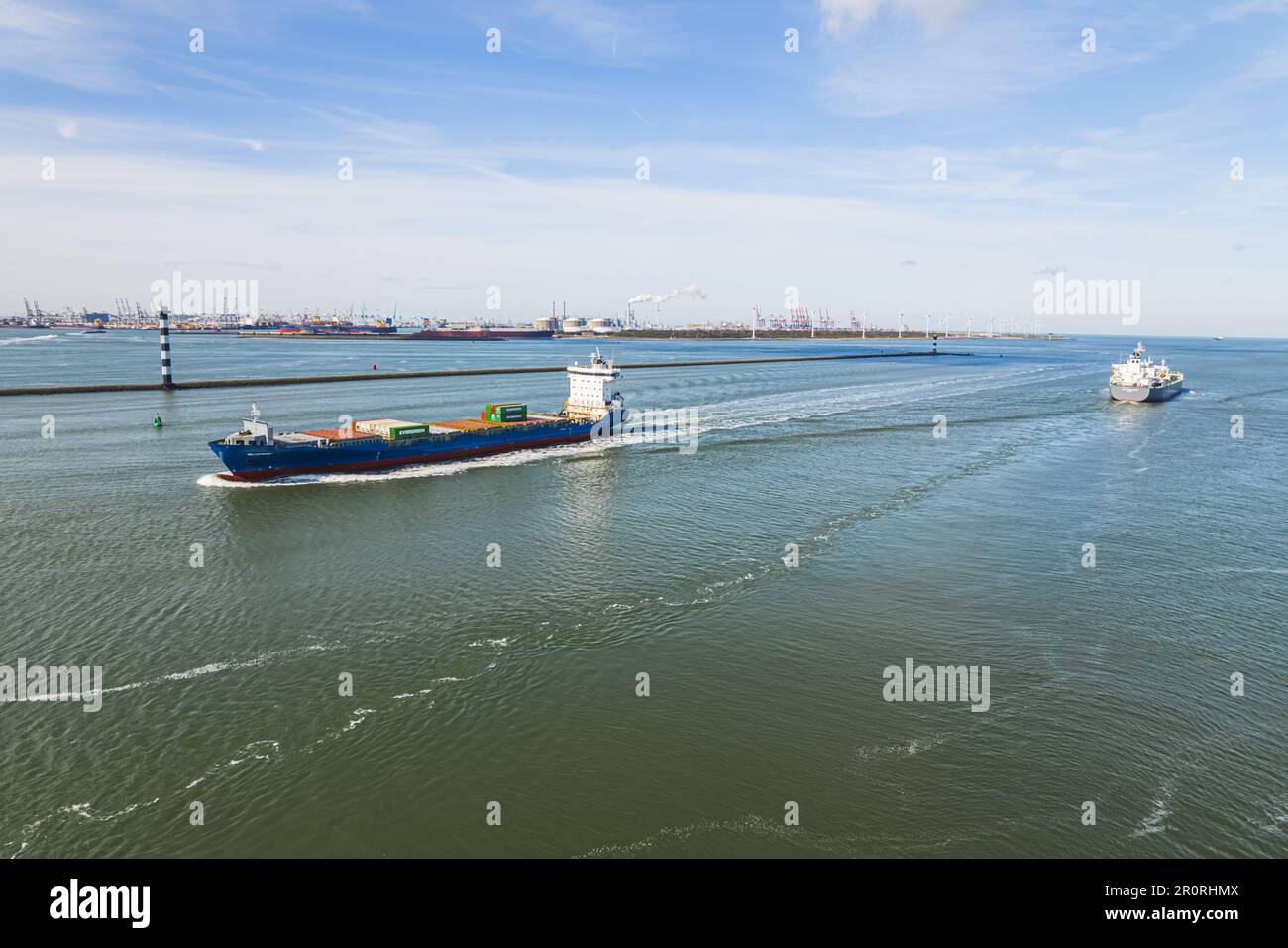 Aerial view of container cargo ships sailing in open sea. High quality ...