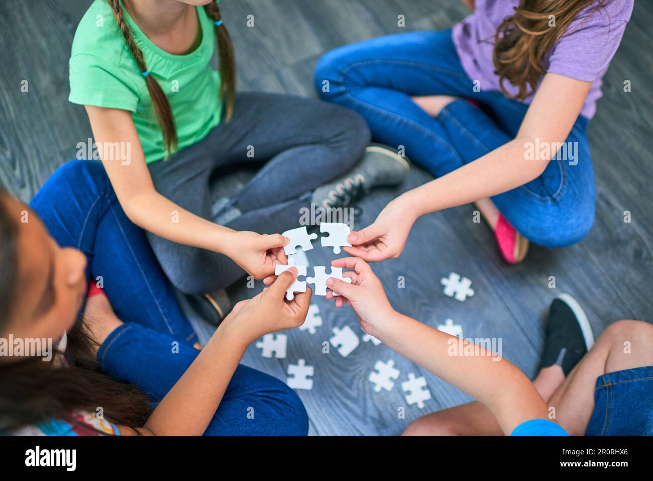 Learning is an important part of play. High angle shot of a group of ...