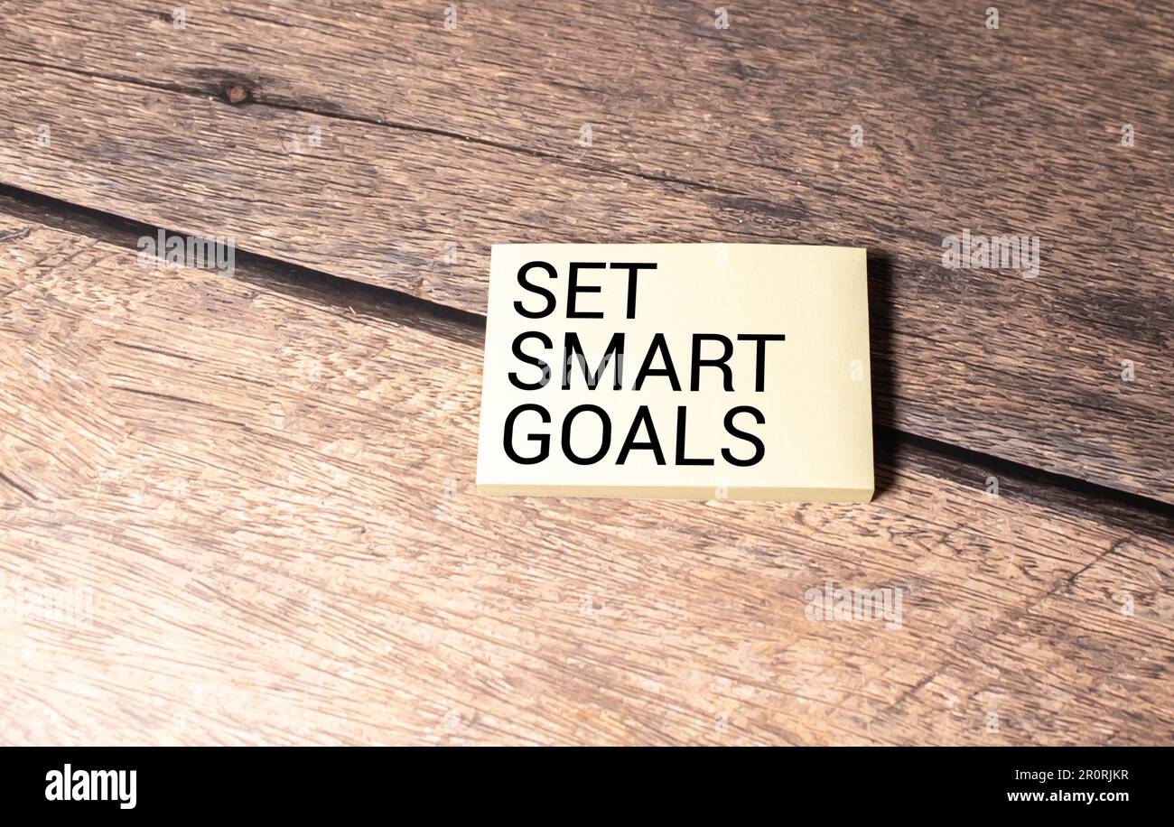 Set smart goals symbol. Concept words Set smart goals on white notebook ...