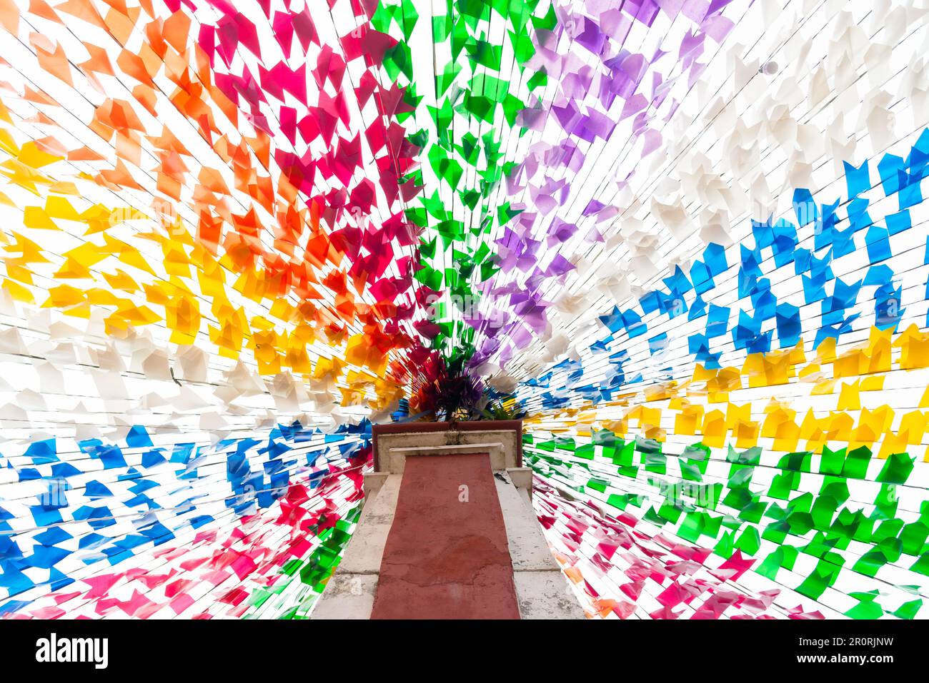 Colorful decoration with flags for the feast of Sao Joao in the city of ...