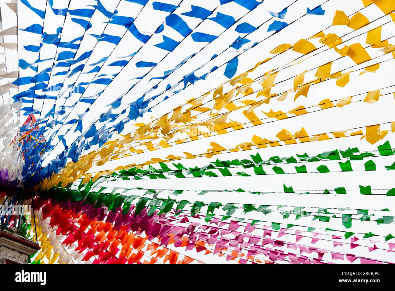 Colorful decoration with flags for the feast of Sao Joao in the city of ...