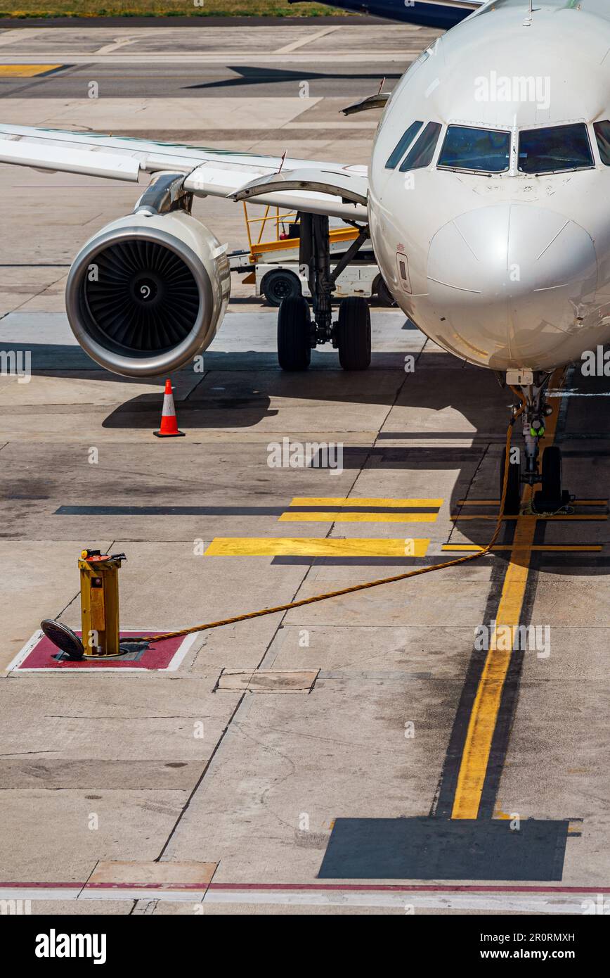 Close-up view of airplane on airfield in airport Stock Photo - Alamy