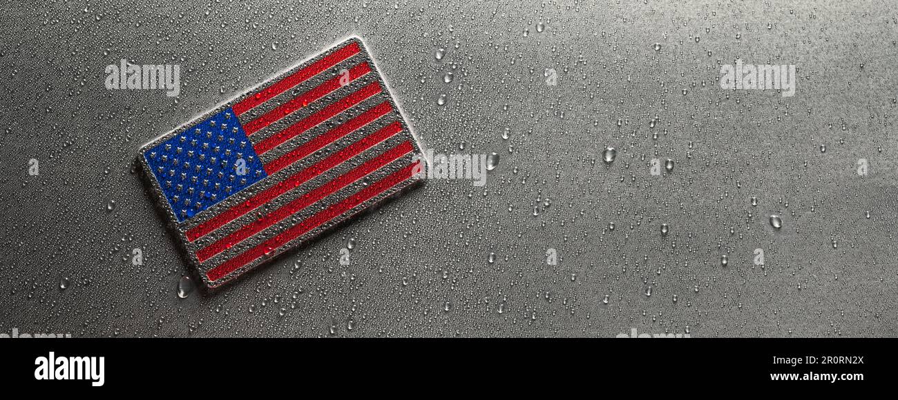 Shiny metal US American flag covered in water drops. Patriotic USA flag ...