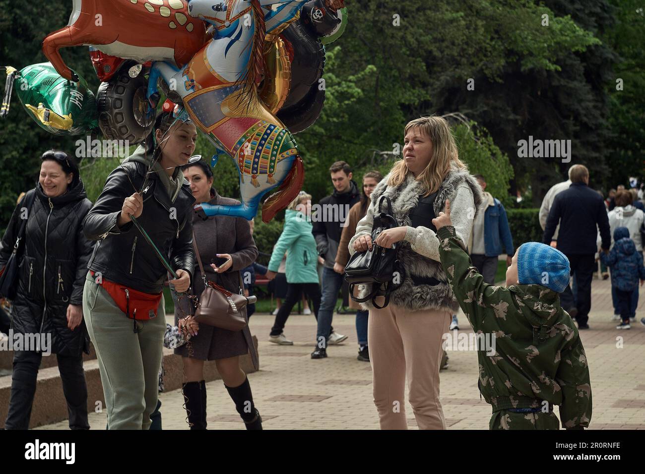 Voronezh, Russia. 09th May, 2023. A vendor sales balloons along the Koltsovsky Square on the ...