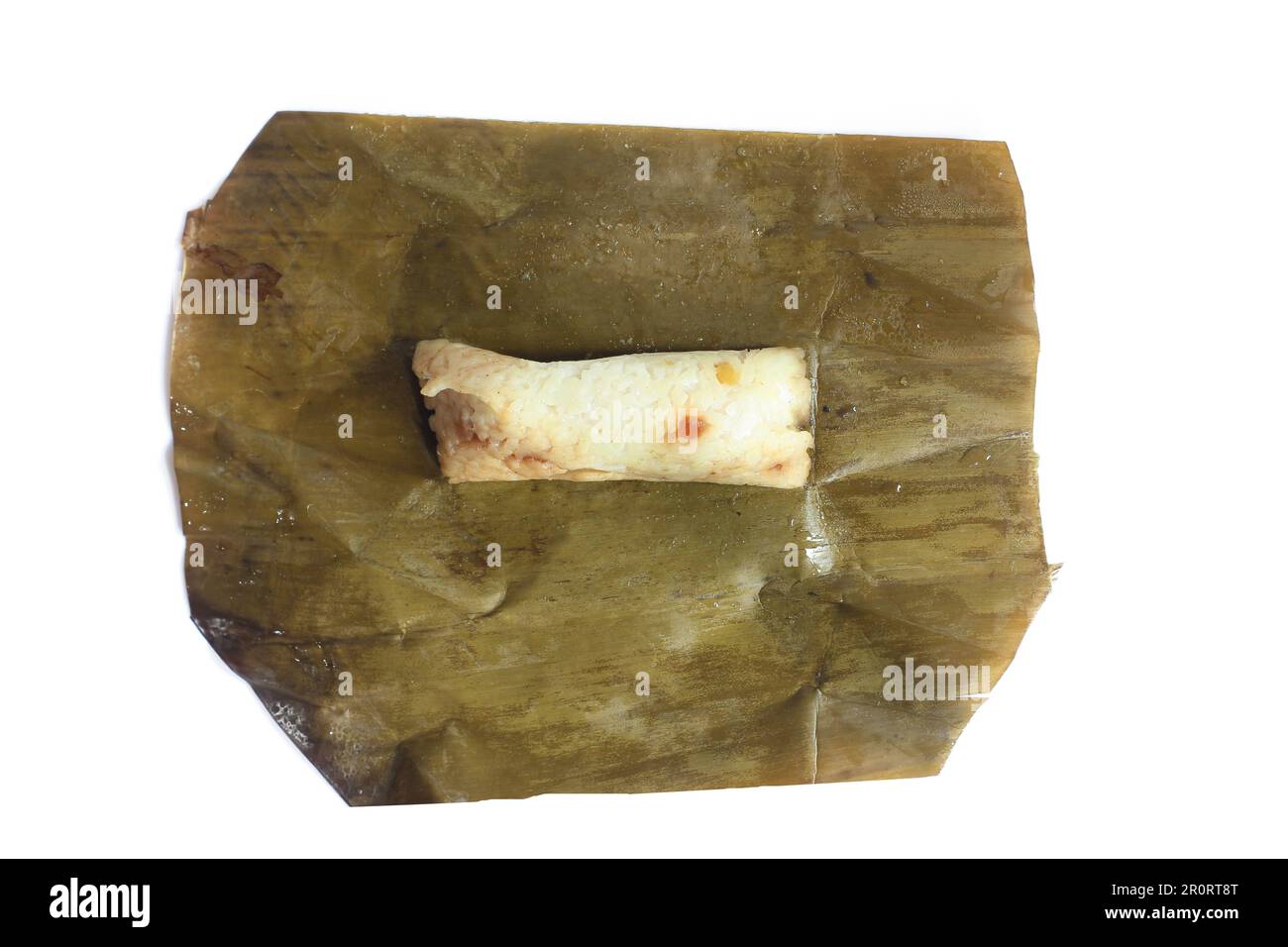 Lontong isolated on white background. Lontong is rice wrapped in banana ...