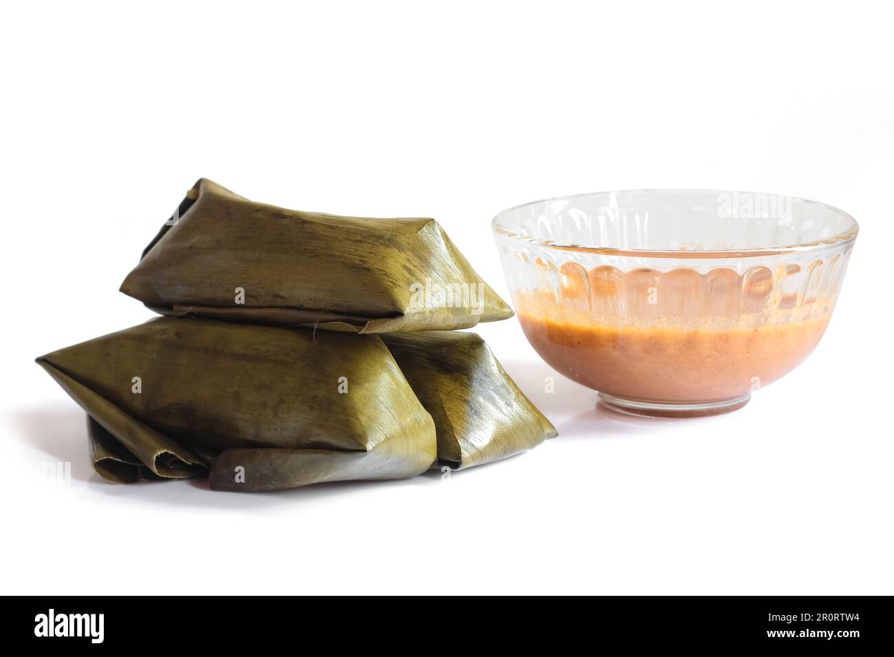 Lontong isolated on white background. Lontong is rice wrapped in banana ...