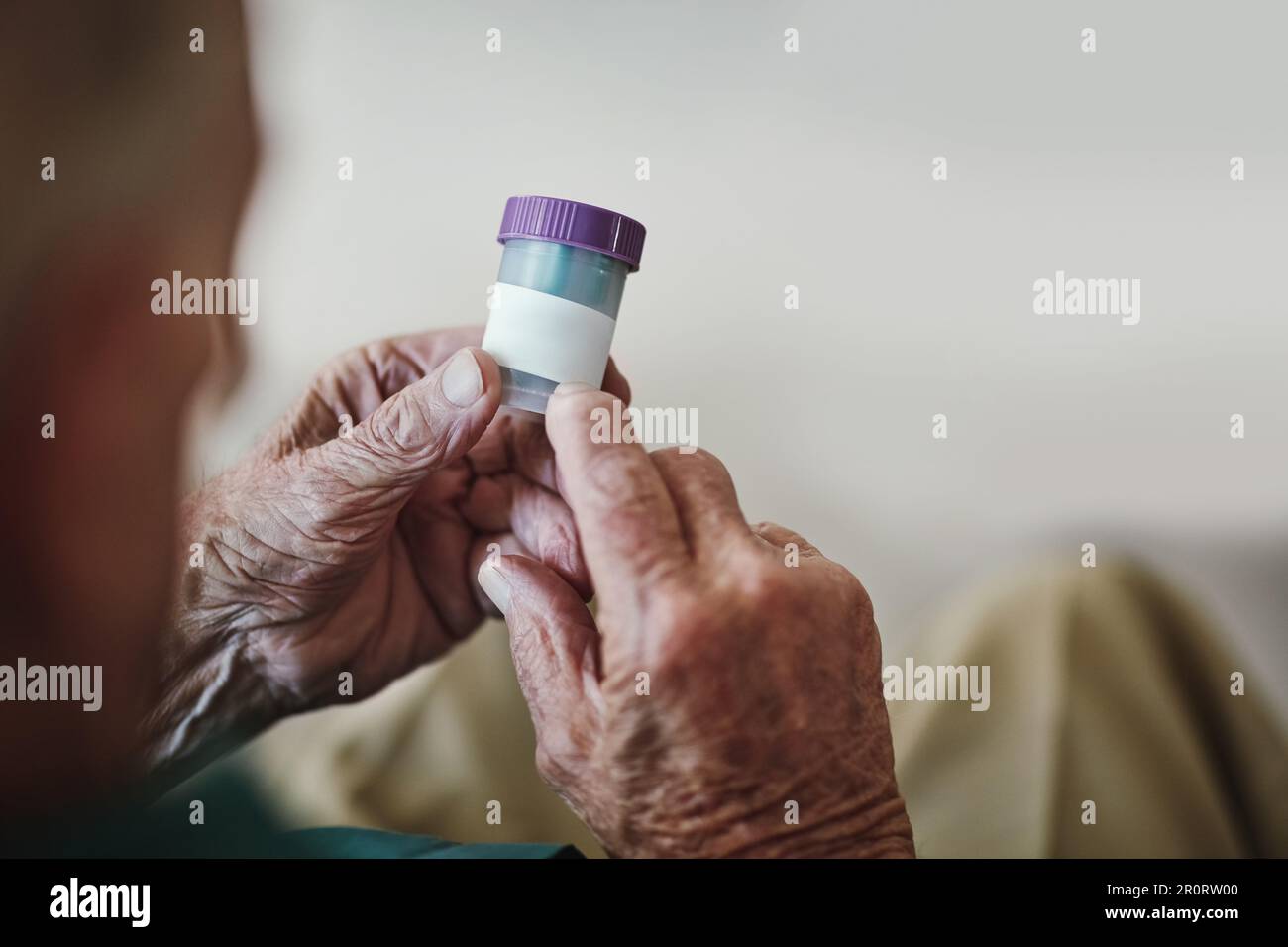 How many should I take per day. a senior man about to take his ...