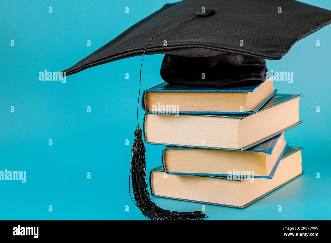 Education and science concept.Graduation Cap with a stack of books ...