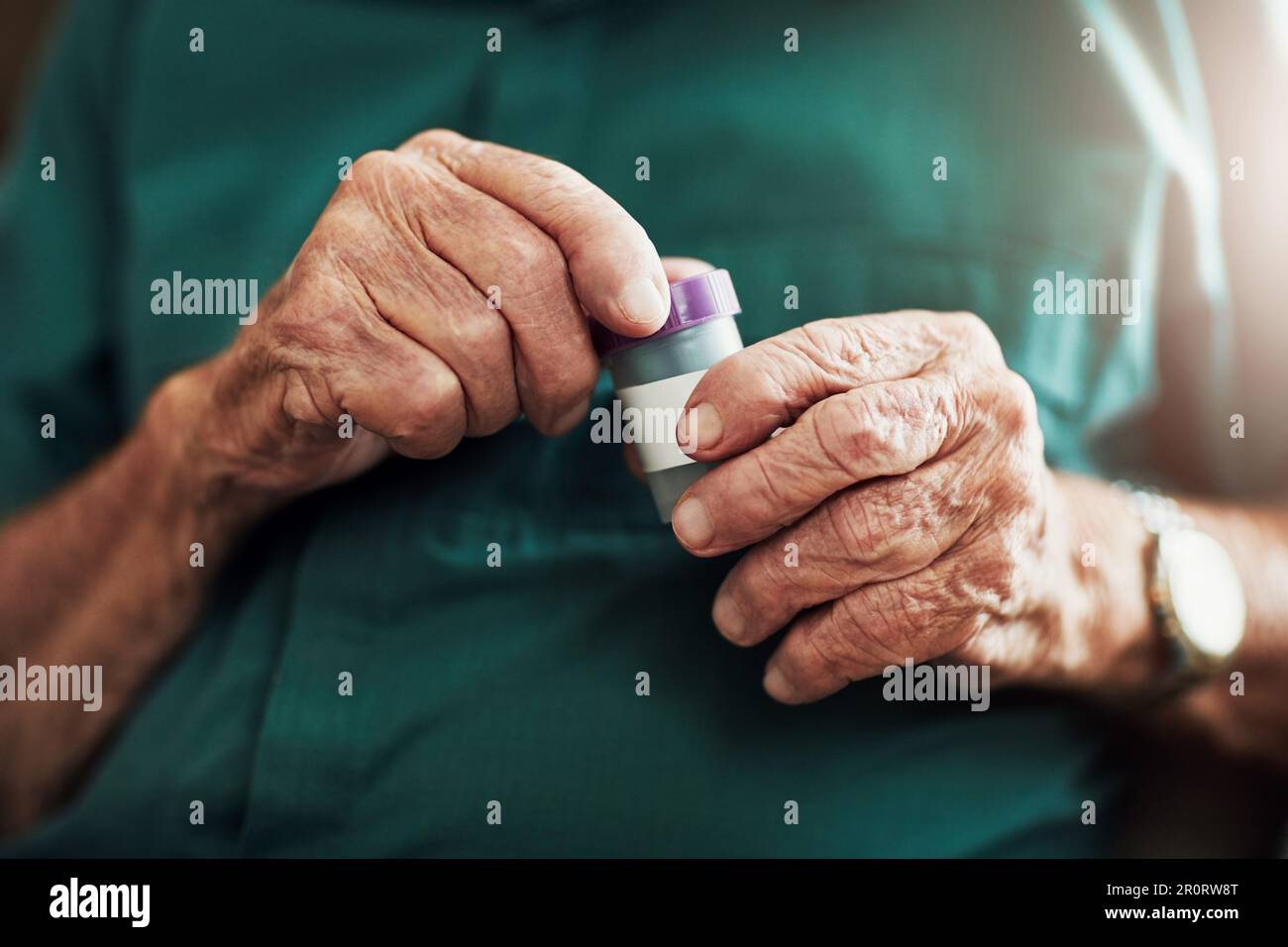 Time for my daily boost. an unrecognizable senior man about to take his ...