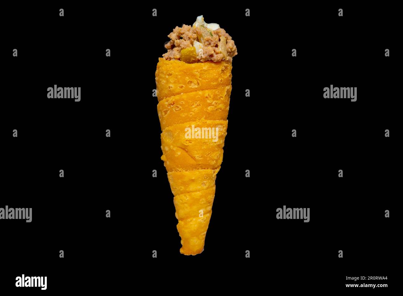 Traditional party snack known as "canudinho"or "tatu tail". Stuffed ...