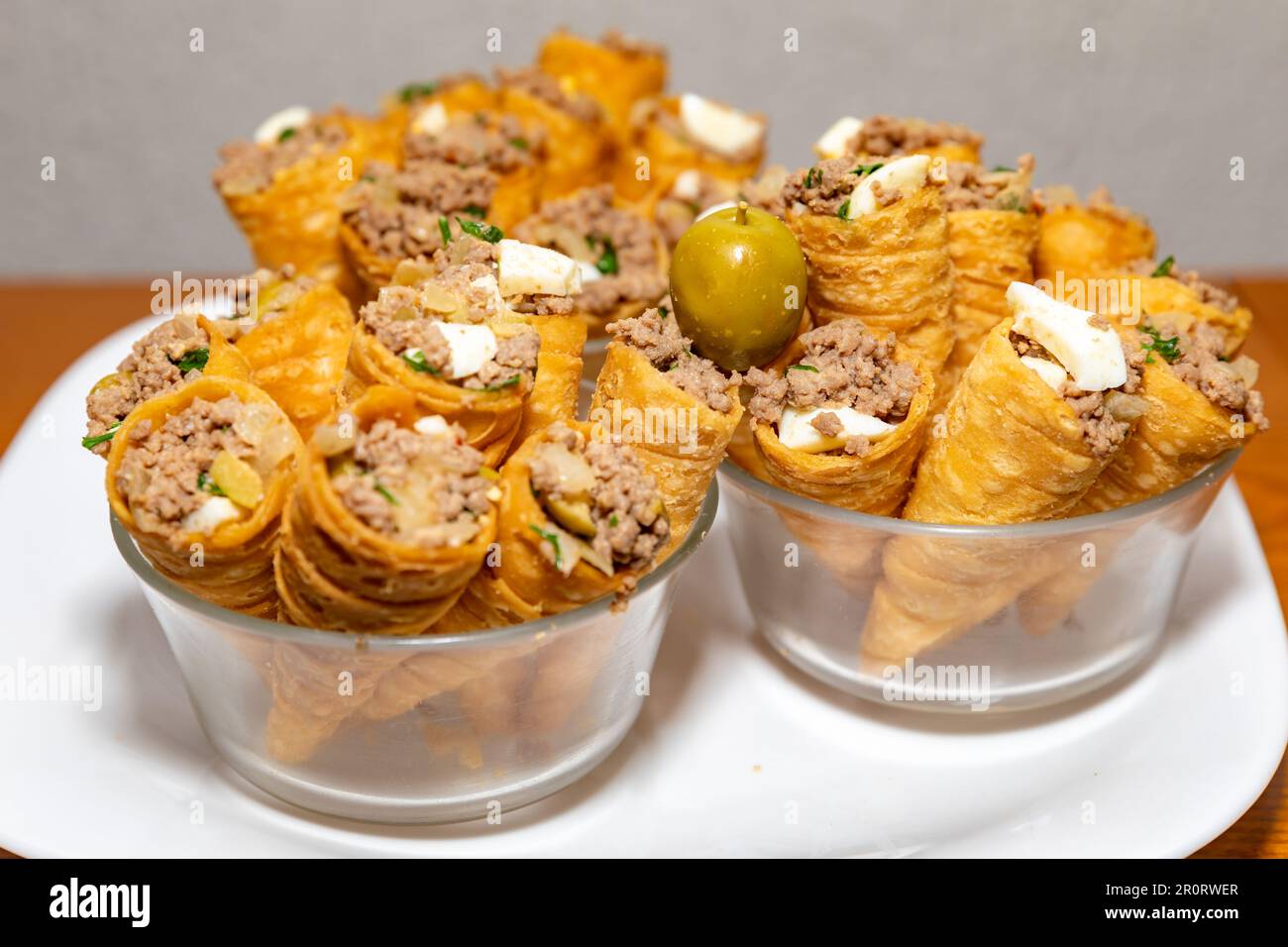 Traditional party snack known as "canudinho"or "tatu tail". Stuffed ...