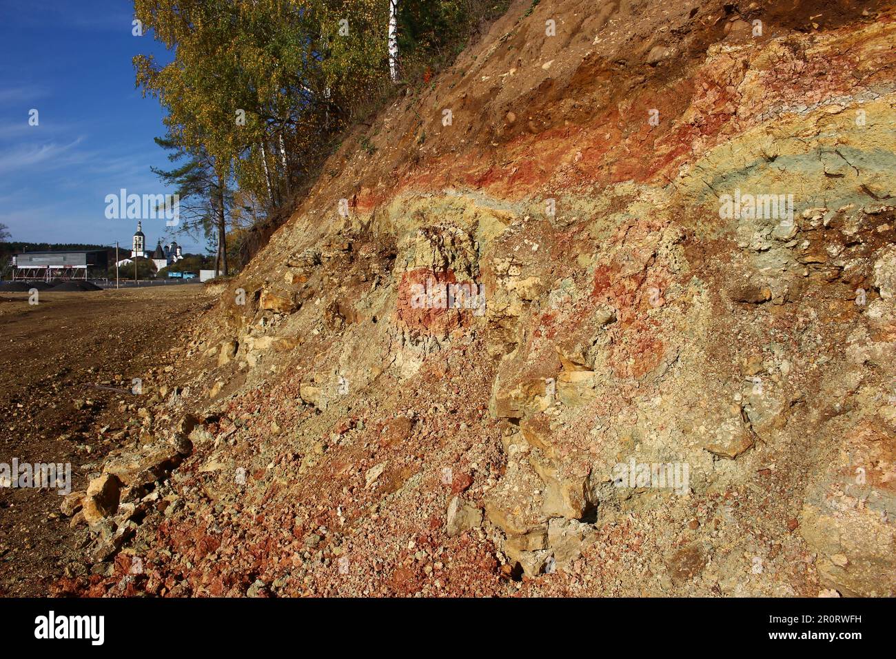 Limestone lying under a layer of variegated clay. Lower section of the ...