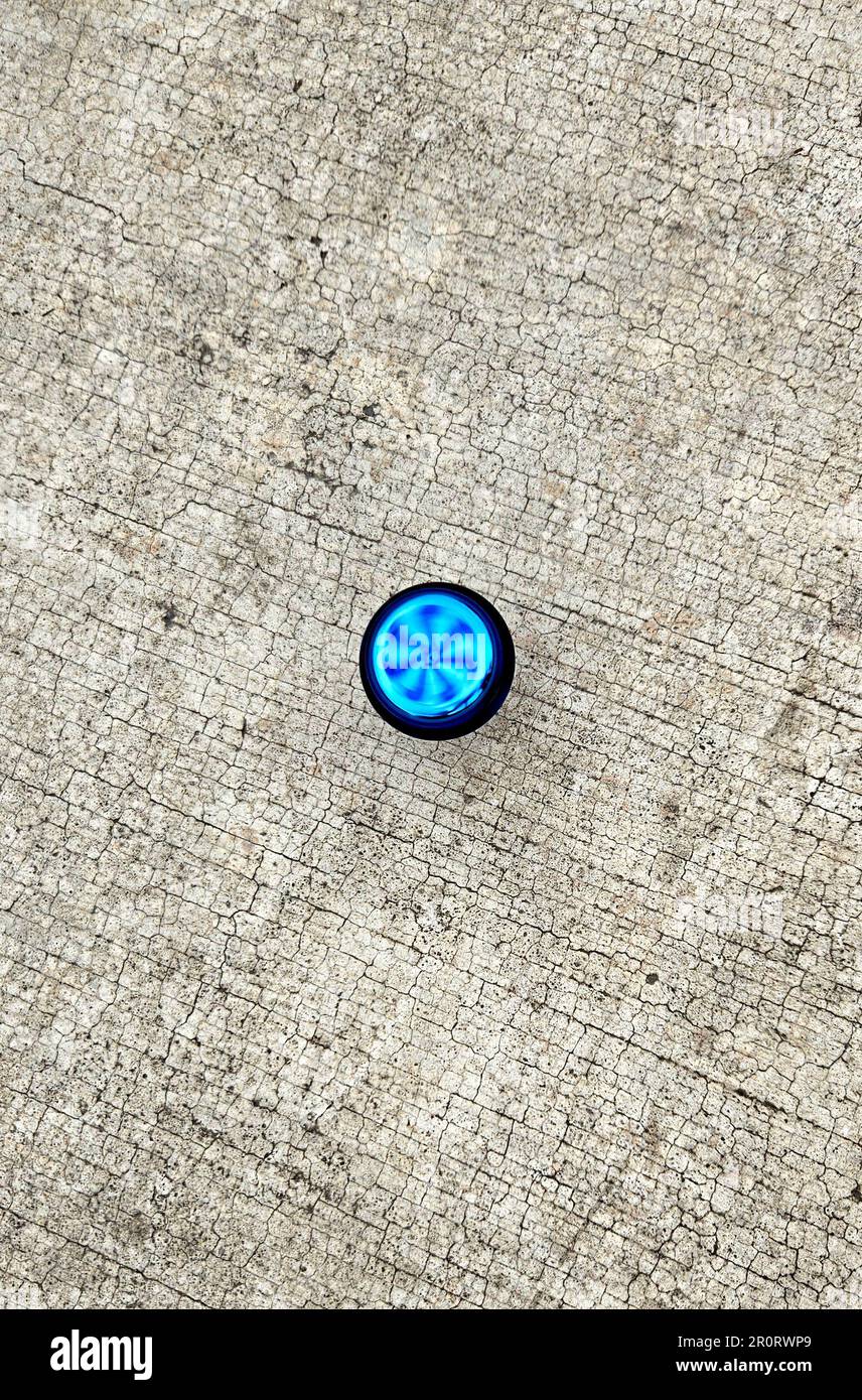 Blue spinning top, toy for children and adults, a type of spinning top ...