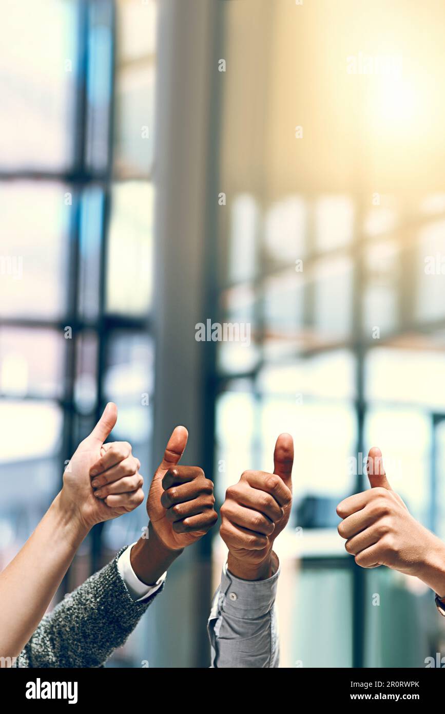 Thumbs up group candid hi-res stock photography and images - Alamy