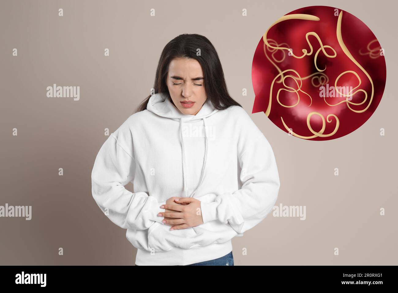 Parasites under microscope and woman suffering from helminthiasis Stock ...