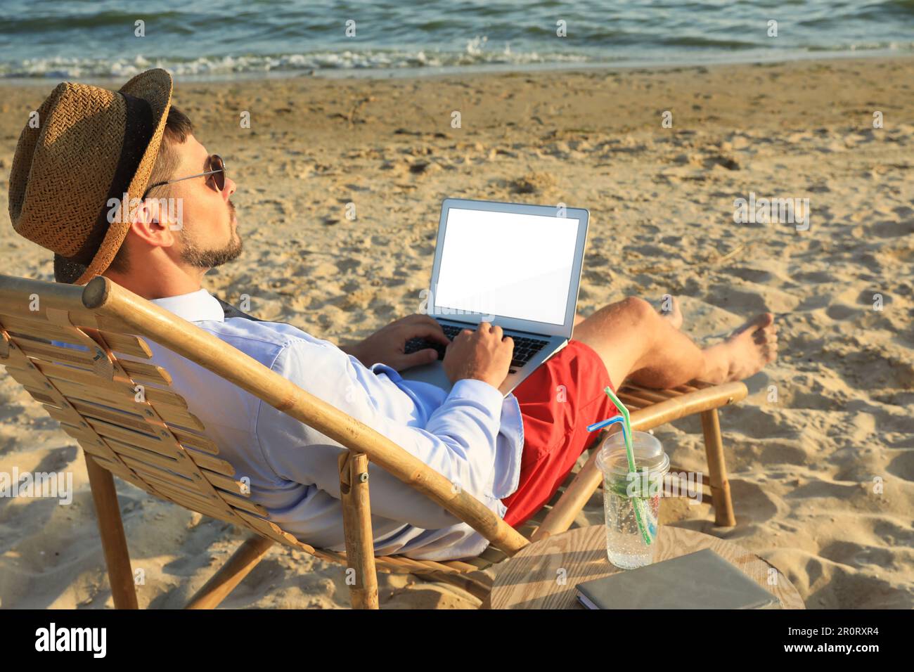 Laptop beach cocktail hi-res stock photography and images - Alamy