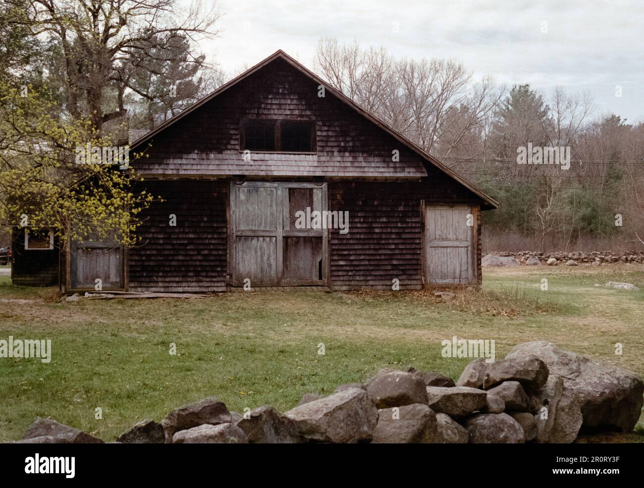 Lexington, Massachusetts USA - April 2023 - A weather worn wood barn ...