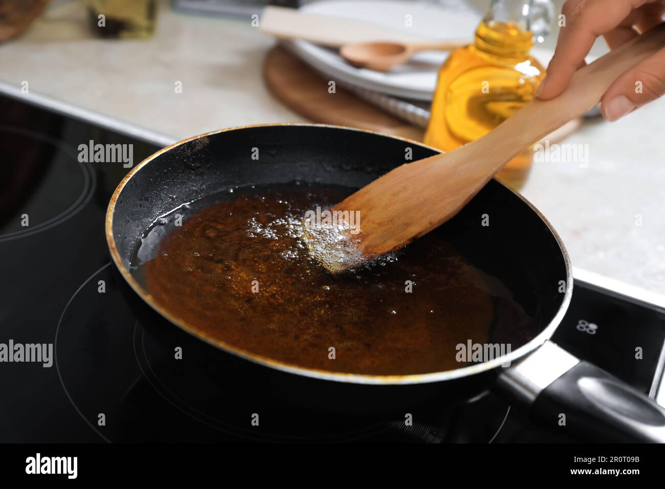 Woman used cooking oil hi-res stock photography and images - Alamy