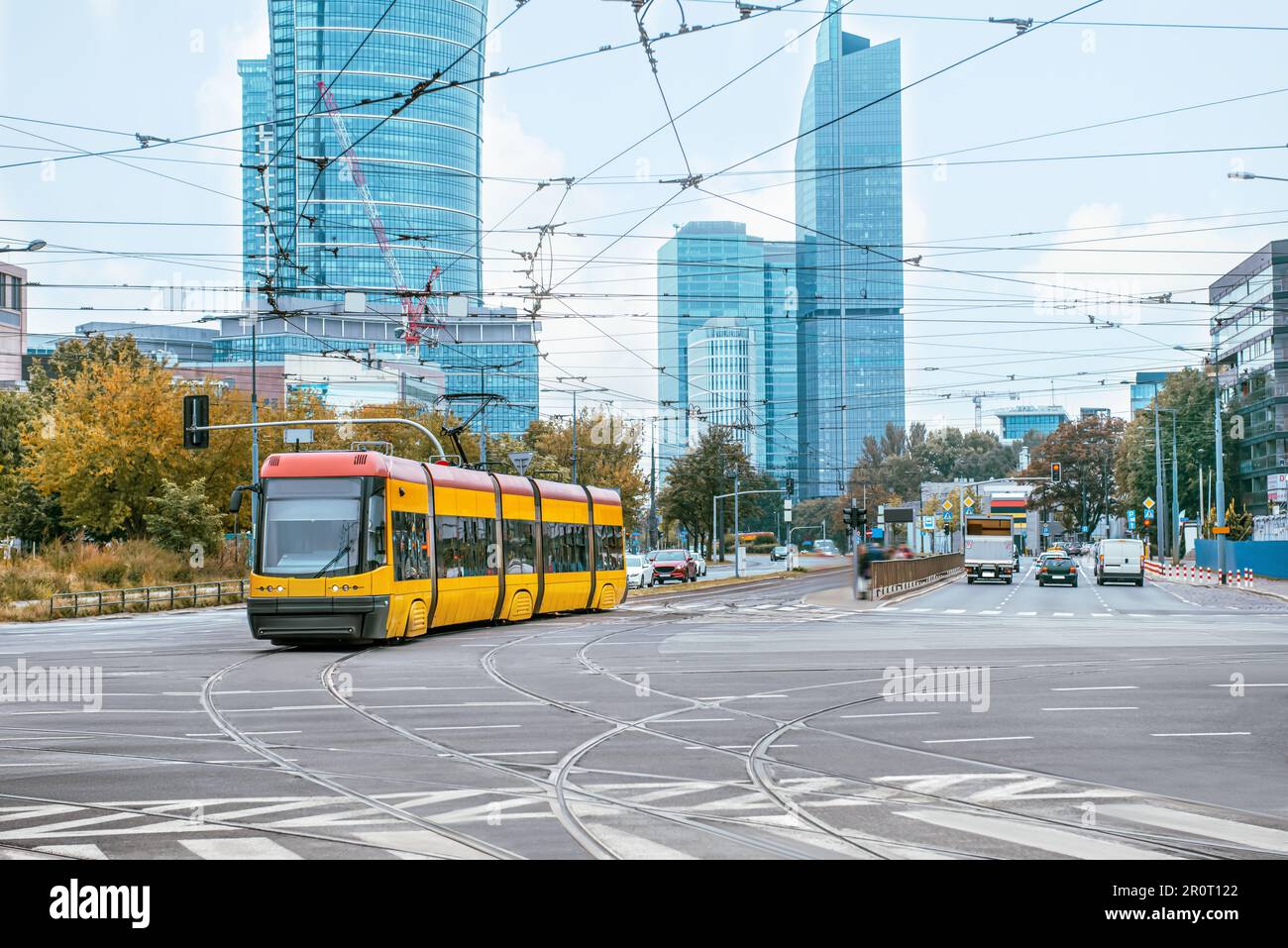 Modern tram on city street. Public transport Stock Photo - Alamy
