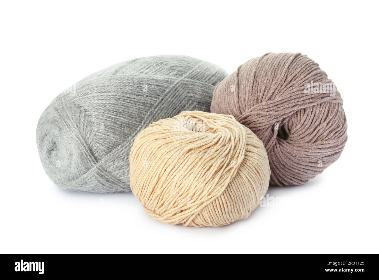 Different balls of woolen knitting yarns on white background Stock ...