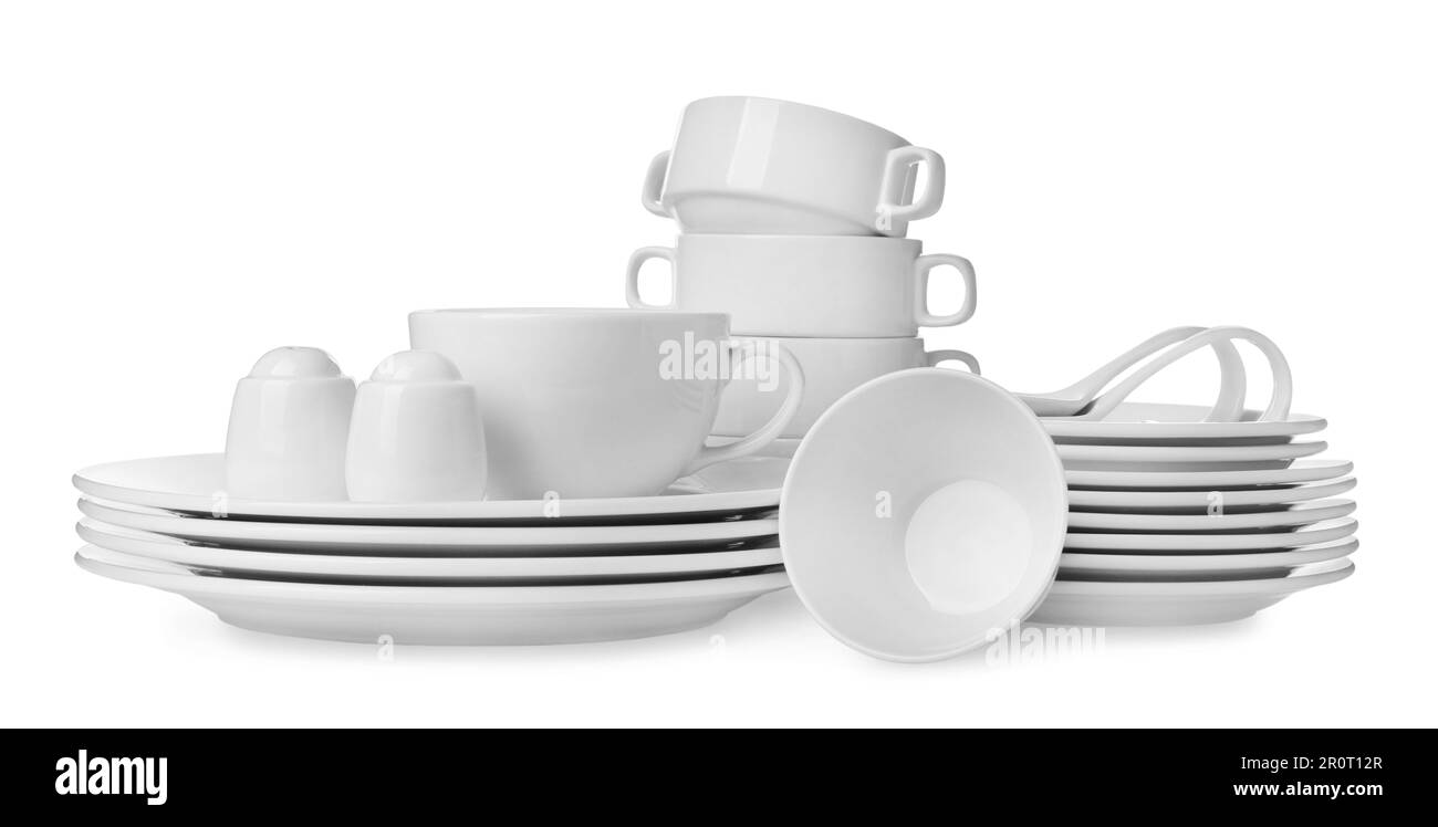 Set of clean dishware isolated on white Stock Photo - Alamy