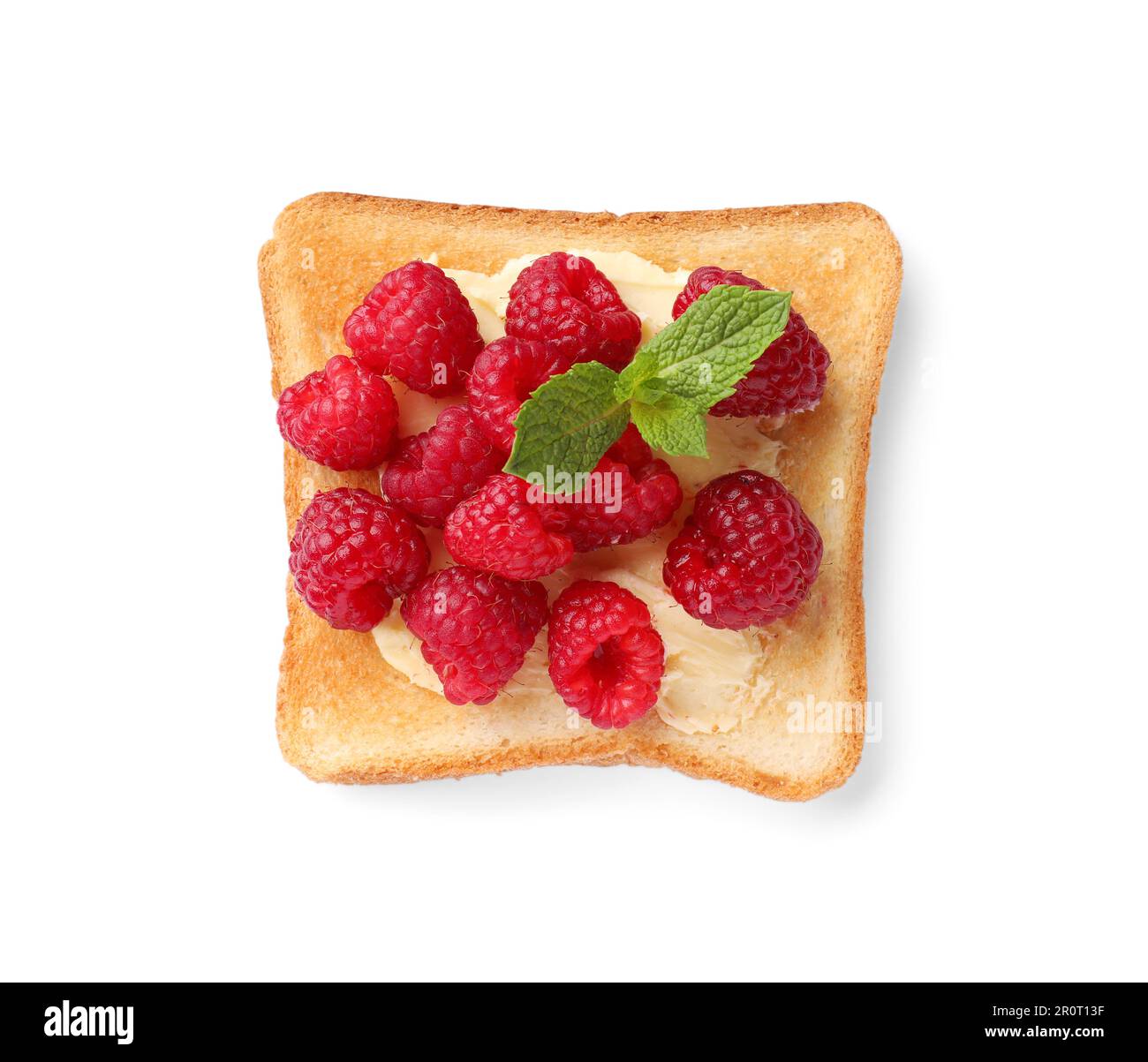 Tasty toast with butter, raspberry and mint isolated on white, top view ...