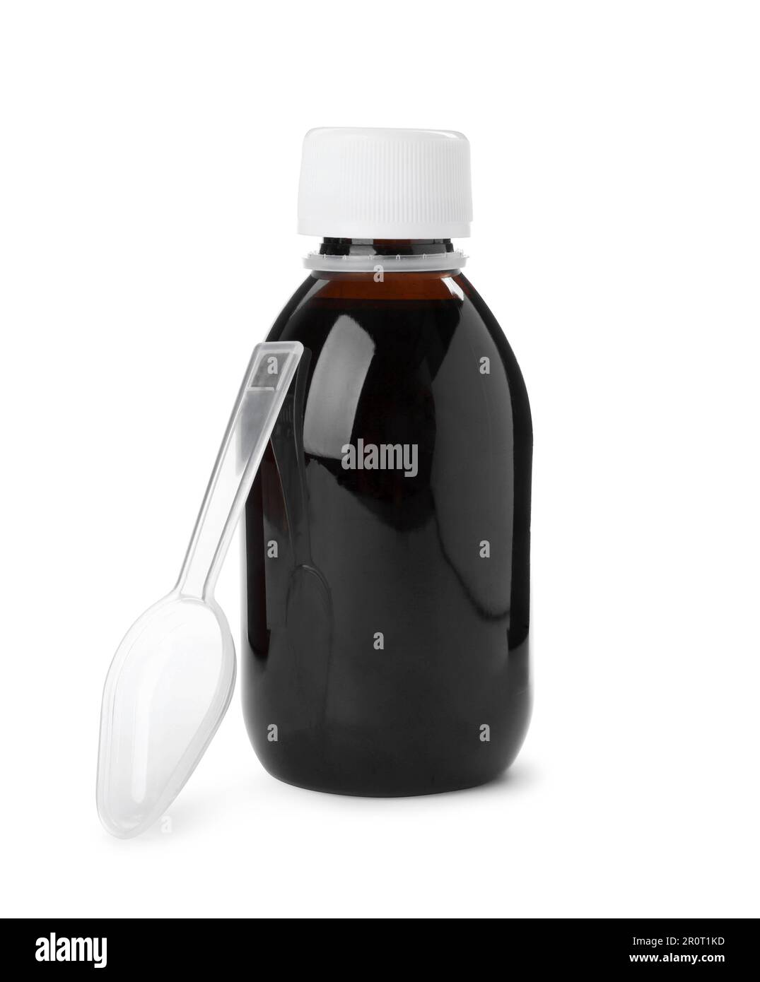 Bottle of syrup with plastic spoon on white background. Cough and cold ...