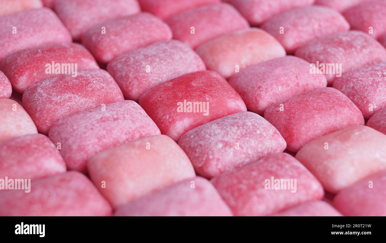 Many pink chewing gums as background, closeup Stock Photo - Alamy