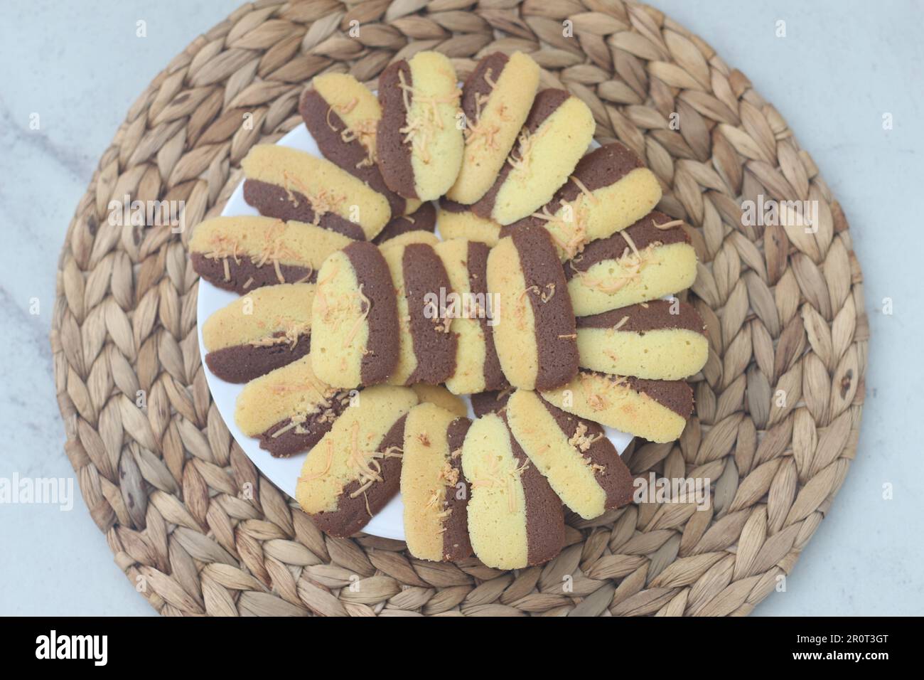 Kue Lidah Kucing or cat tongue cookies. Commonly served during Eid Al ...