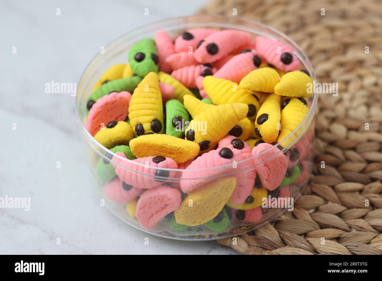 caterpillar cake with various colors. presented during Hari Raya or Eid ...