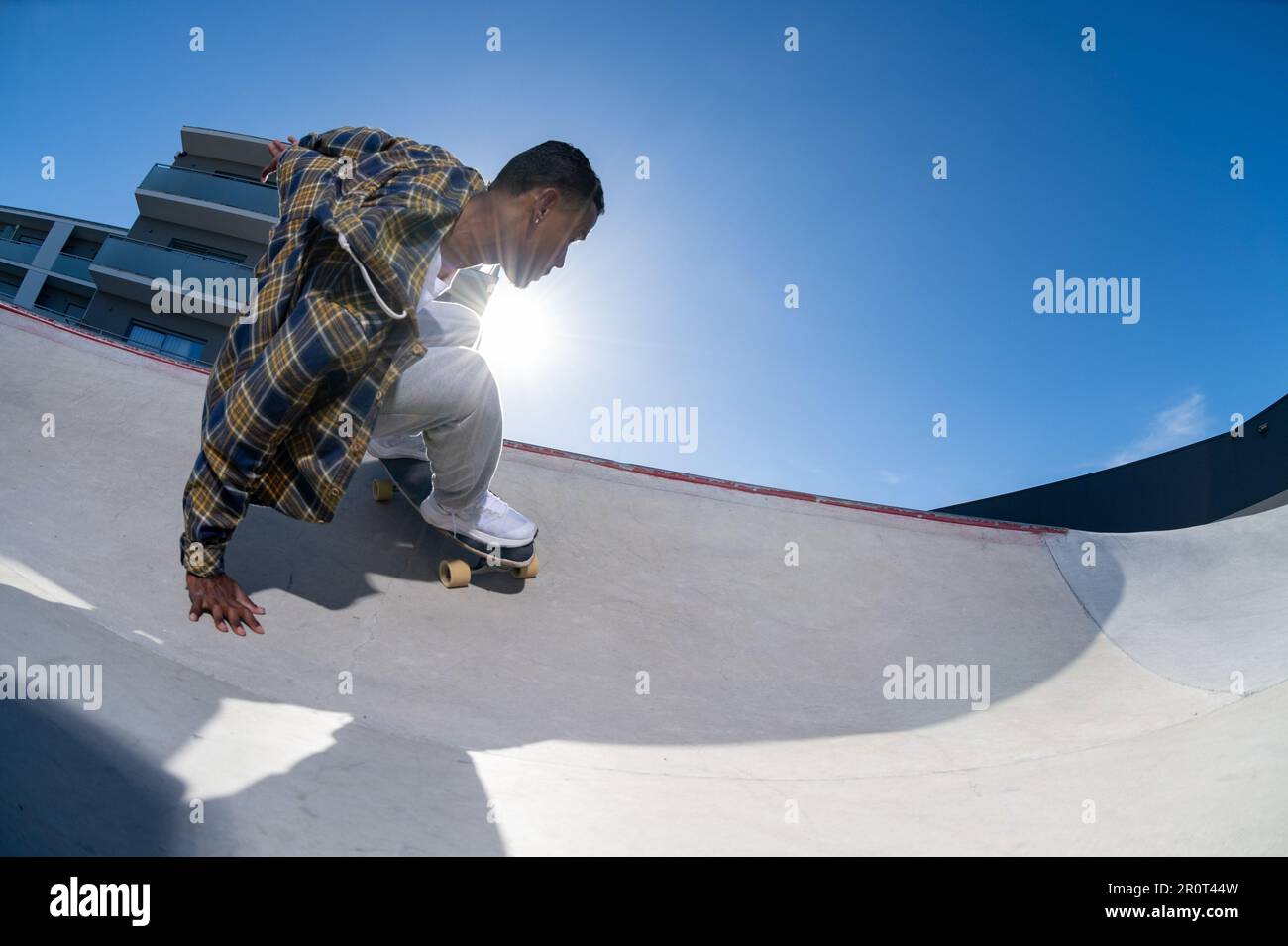 Skateboarder performing slide hi-res stock photography and images - Alamy