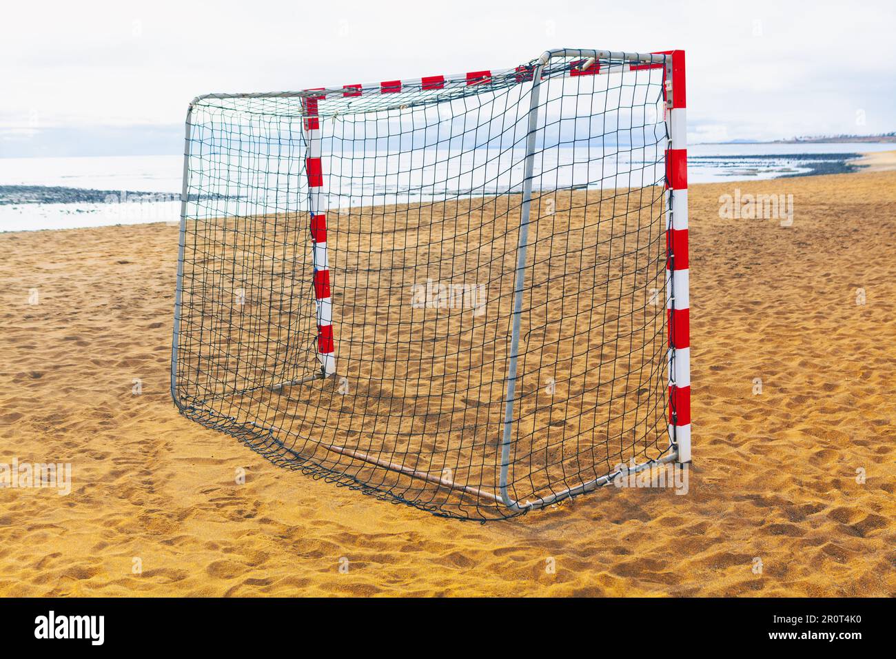 Goal post at beach . Football field on the sand Stock Photo - Alamy