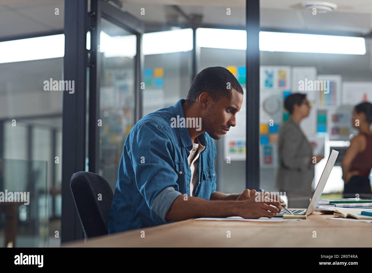 Fully focused. a businessman working in his office Stock Photo - Alamy