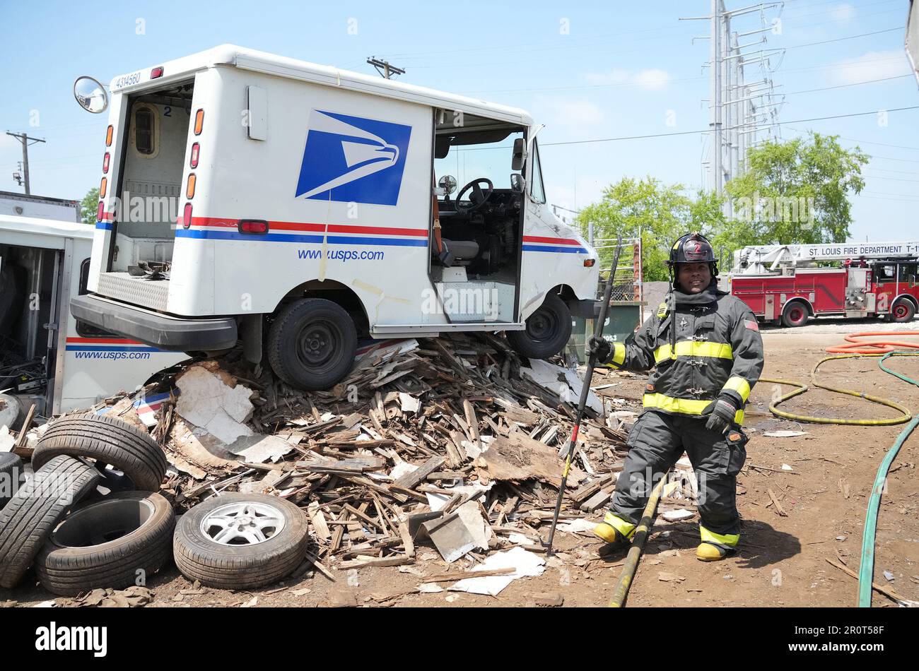 St. Louis, United States. 09th May, 2023. A St. Louis firefighter walks ...