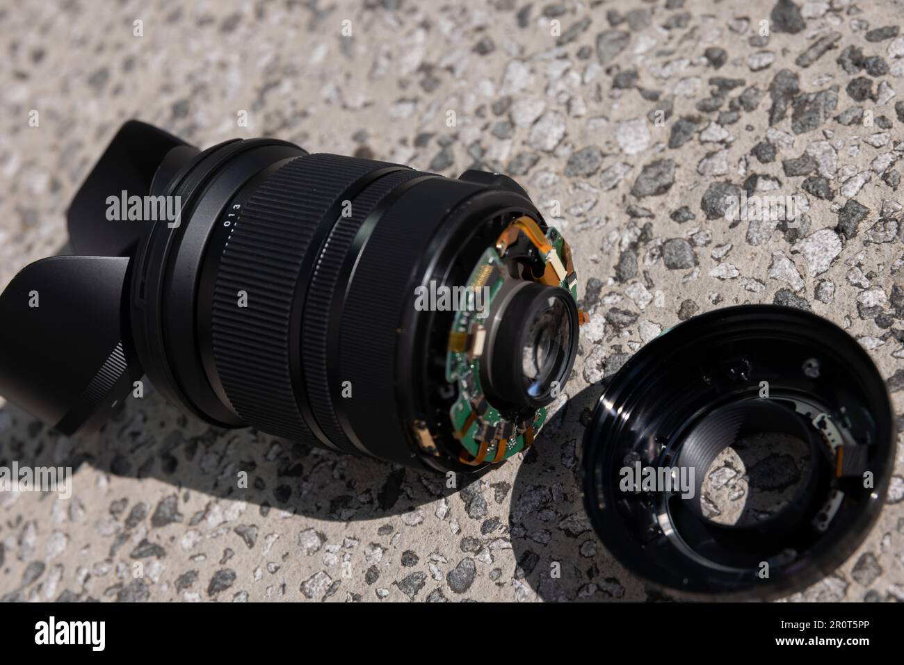 A broken lens on the street sunny day handheld Stock Photo - Alamy