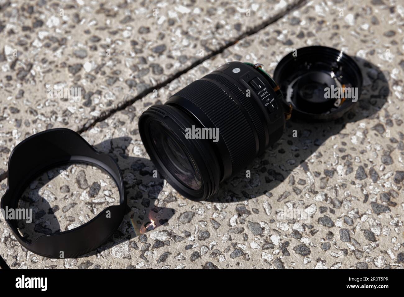A broken lens on the street sunny day handheld Stock Photo - Alamy