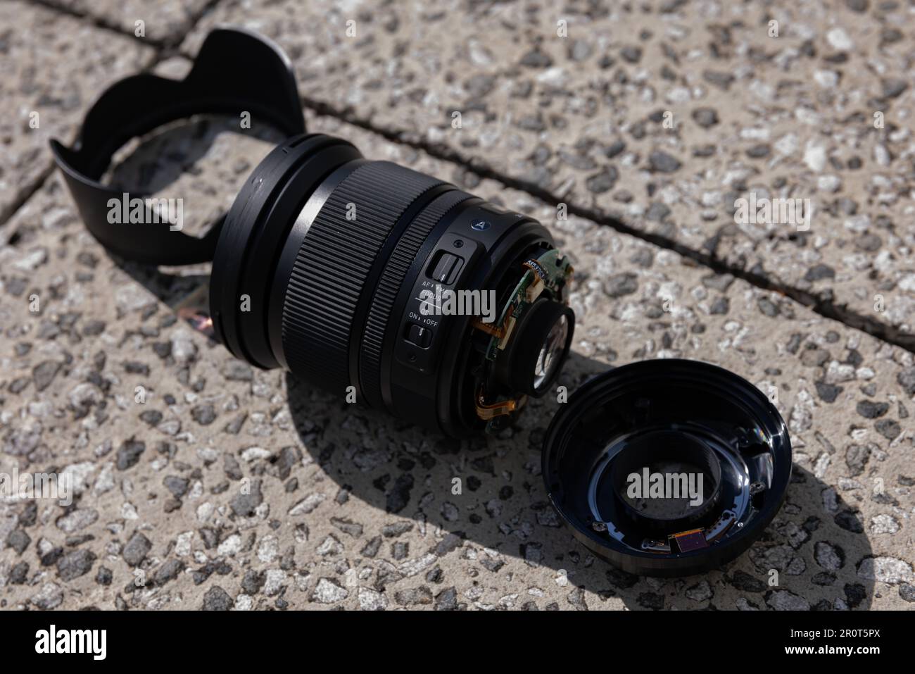 A broken lens on the street sunny day handheld Stock Photo - Alamy