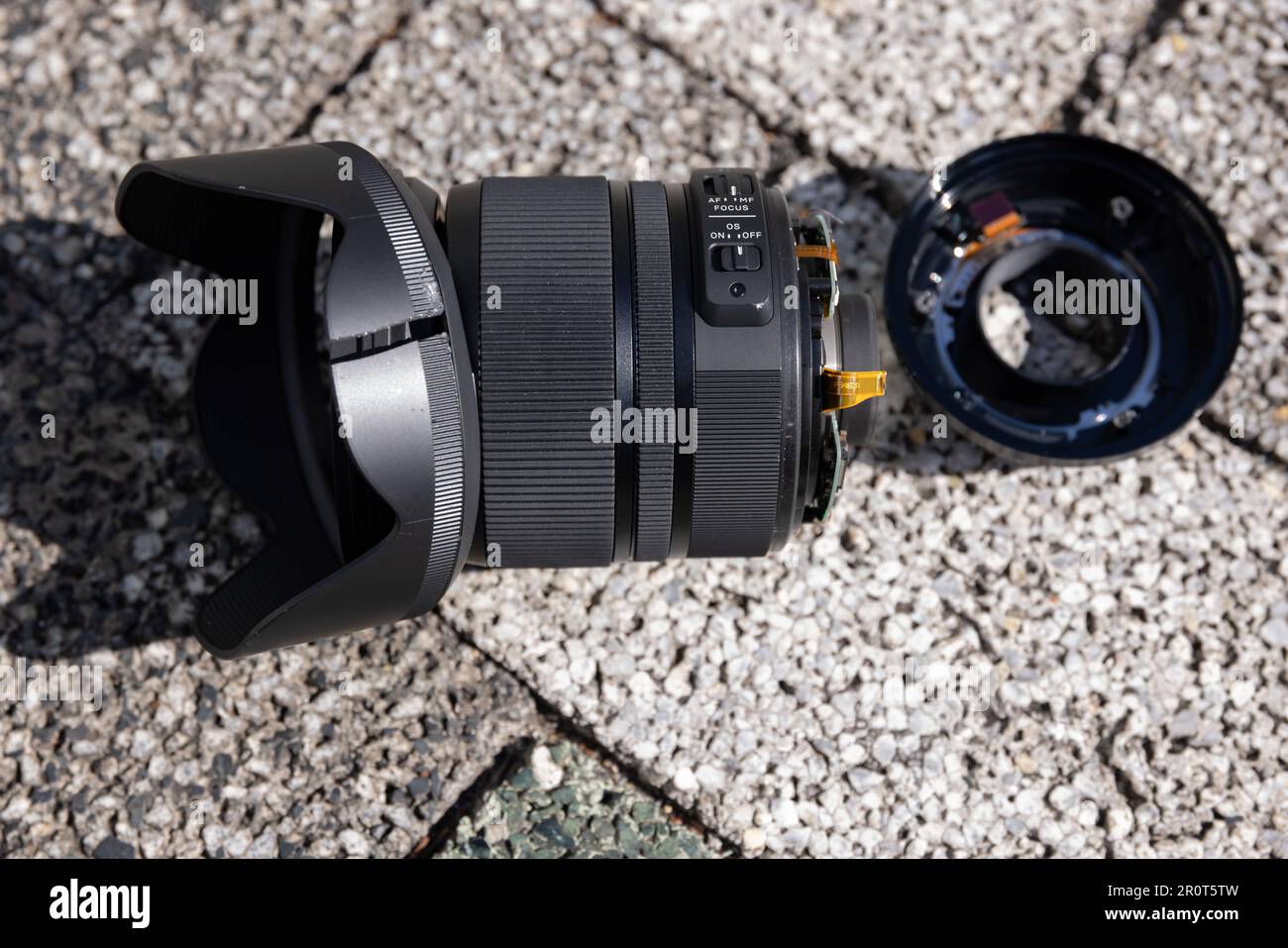 A broken lens on the street sunny day handheld Stock Photo - Alamy