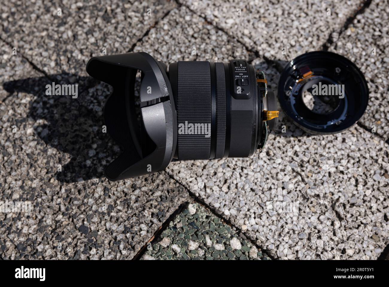 A broken lens on the street sunny day handheld Stock Photo - Alamy