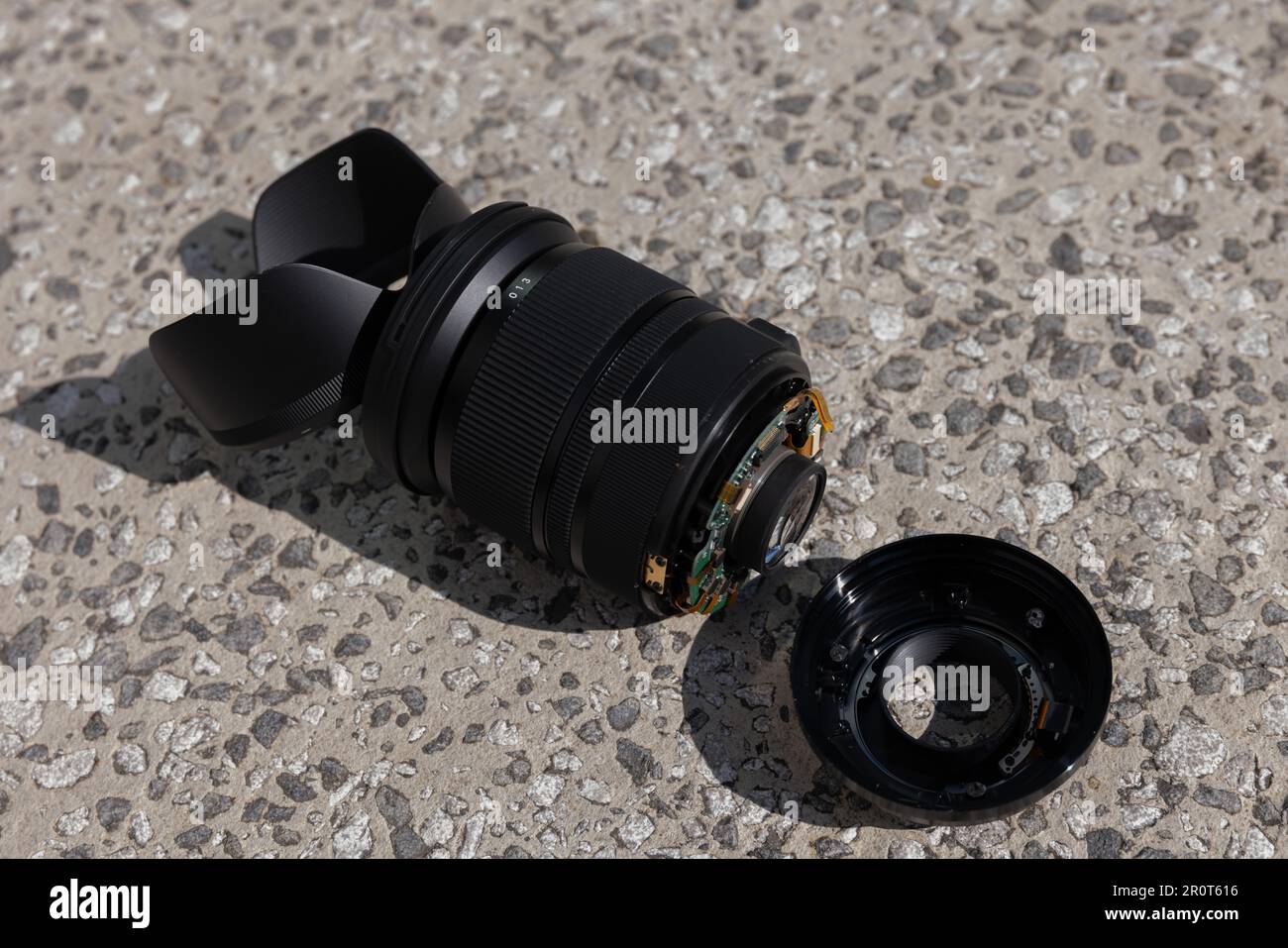 A broken lens on the street sunny day handheld Stock Photo - Alamy