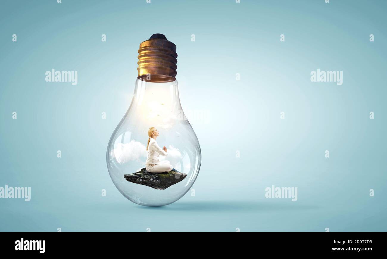 Woman light bulb doing hi-res stock photography and images - Alamy