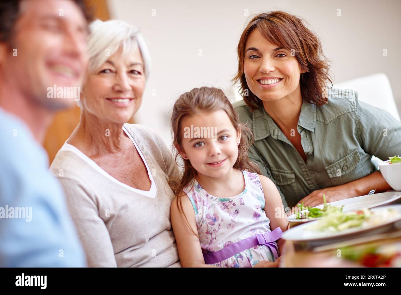 Bonding over a delicious meal. a multi-generational family having a ...