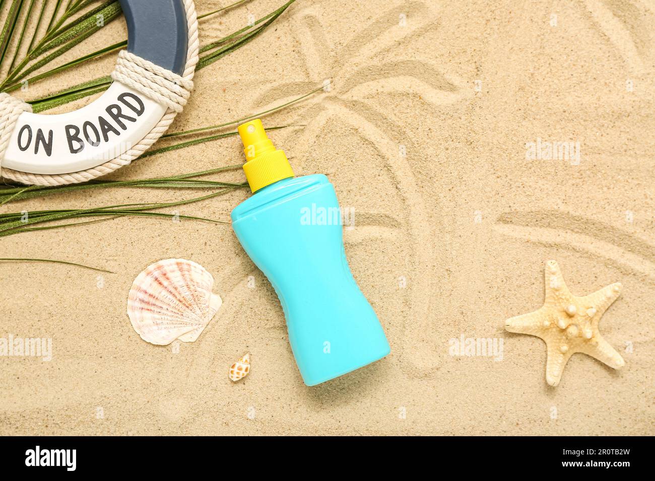 Creative composition with sunscreen cream, lifeline and palm leaf on ...