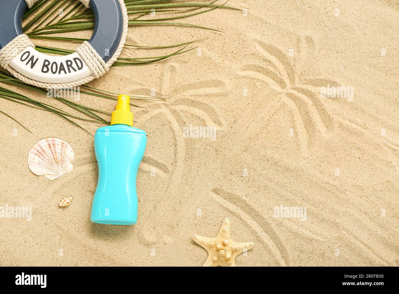 Creative composition with sunscreen cream, lifeline and palm leaf on ...